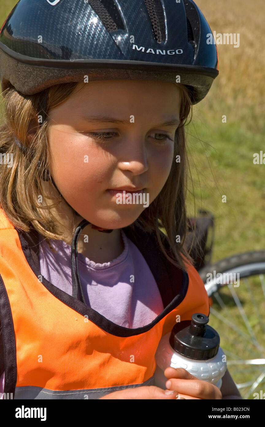 Young girl (aged 8) learning to cycle on holilday. Norfolk Stock Photo ...