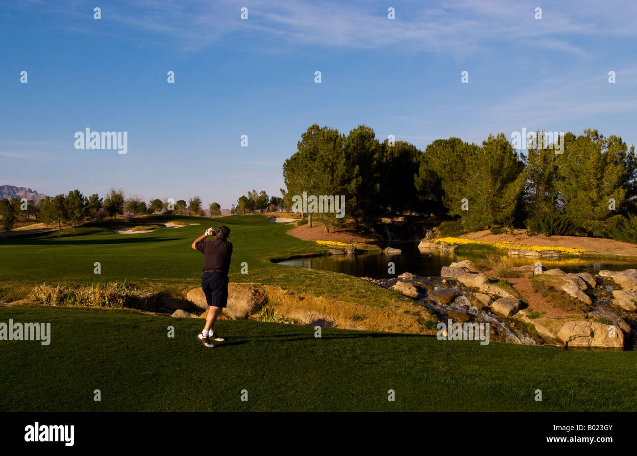 Retired man playing golf at the grand desert course at Primm Valley ...