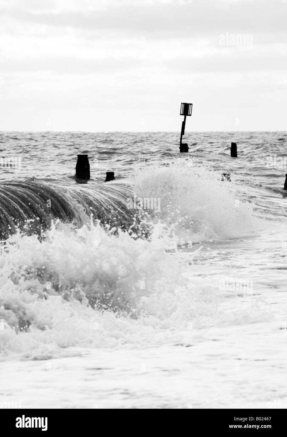 Breaking surf at shore Black and White Stock Photos & Images - Alamy