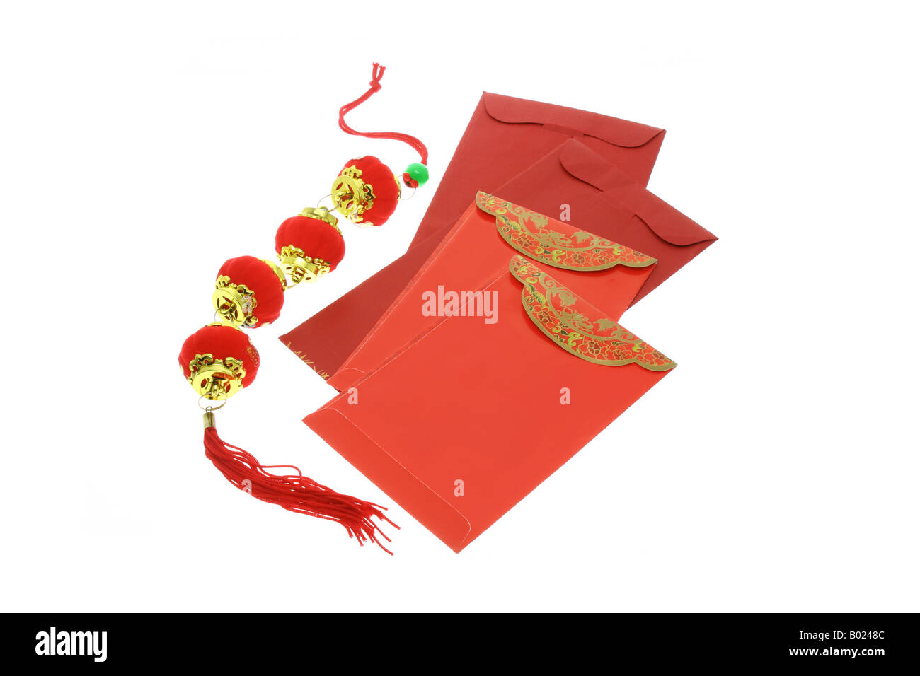 Chinese New Year red packets and lanterns on white background Stock ...