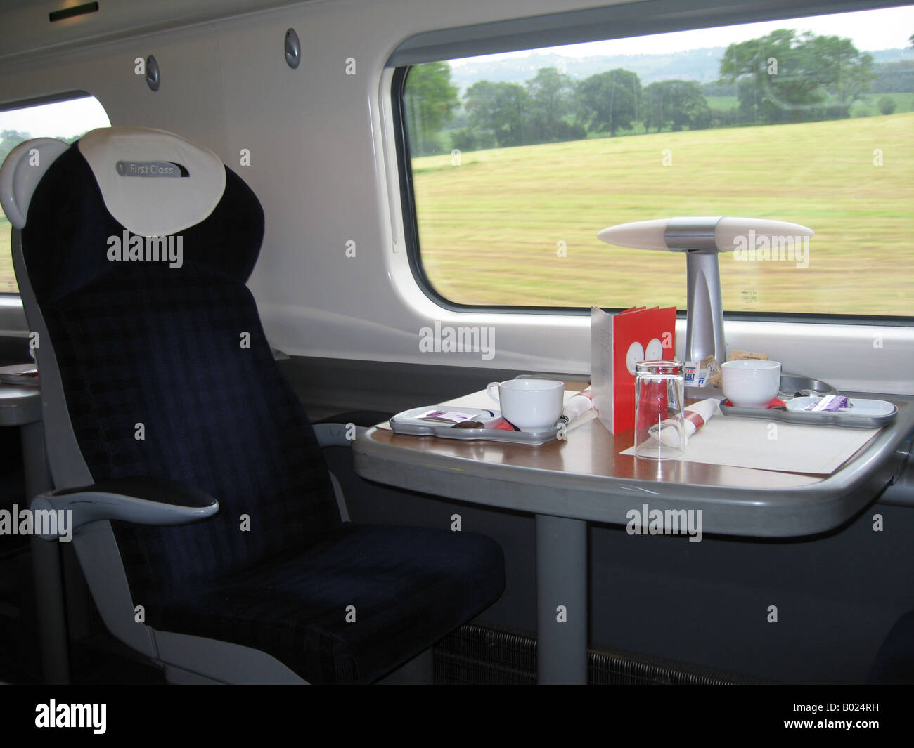 First class train seat Stock Photo - Alamy