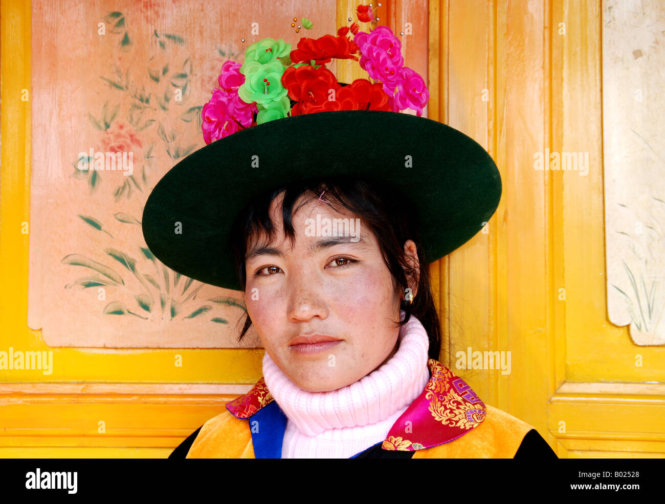 A Tu minority woman in Chinese new year have traditional costume Stock ...