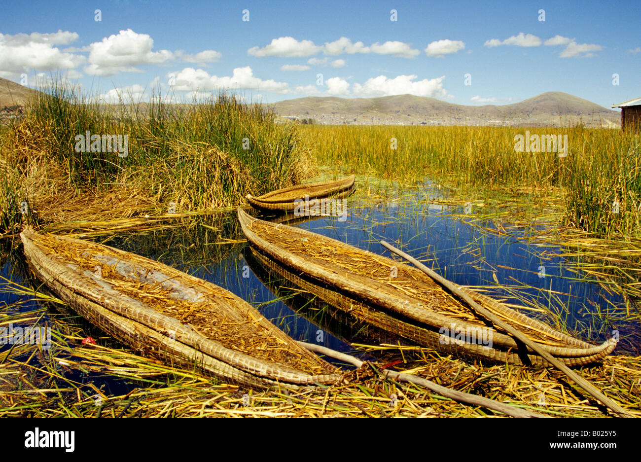 Traditional reed boats crafted from plaited reeds, used by the Uros ...
