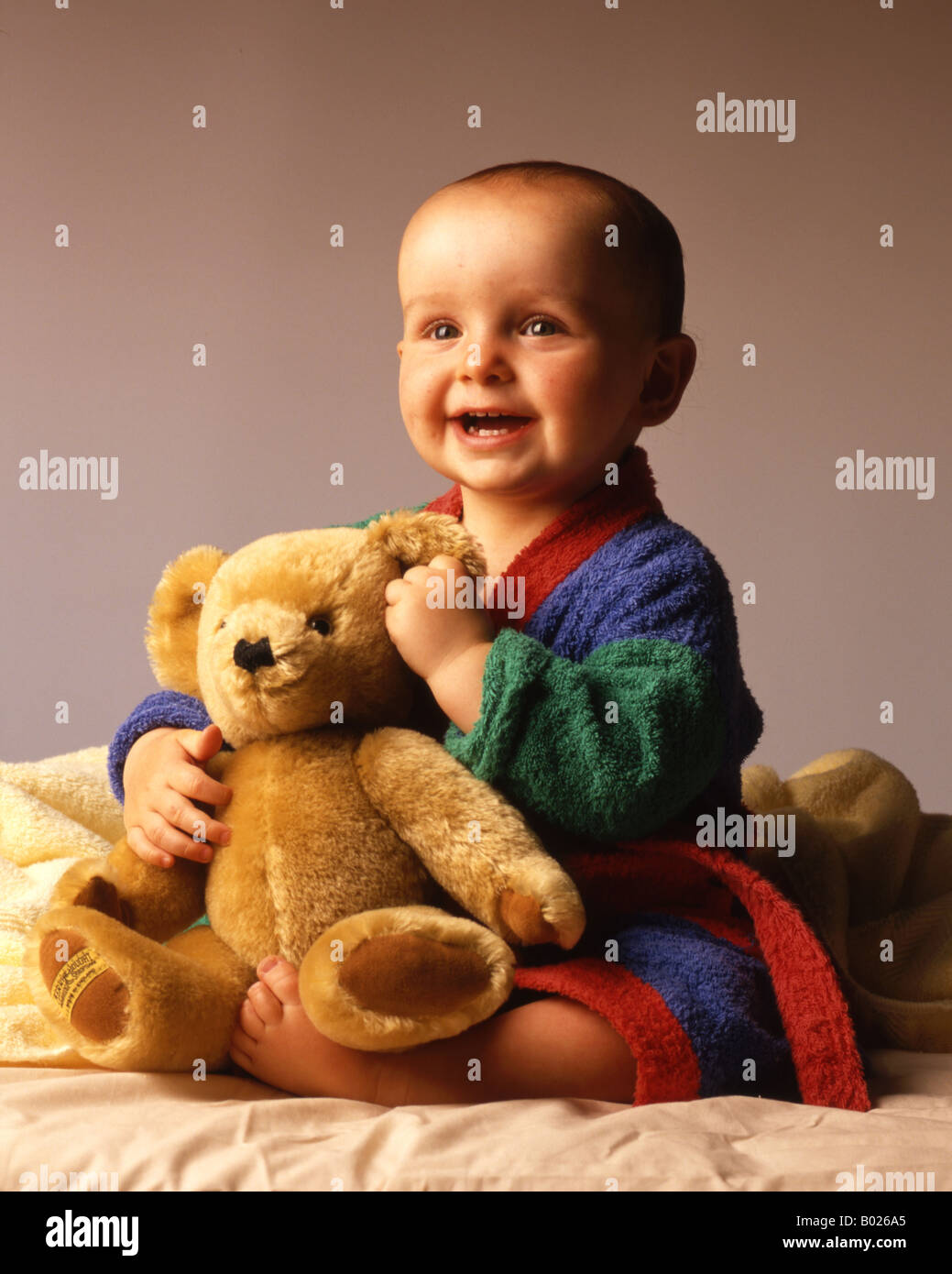 BABY BOY WITH TEDDY BEAR Stock Photo - Alamy