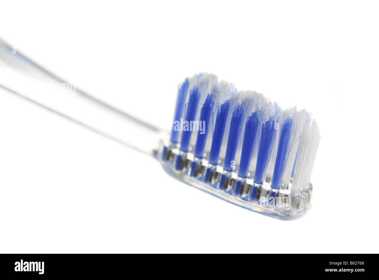 Clear toothbrush isolated on white background Stock Photo - Alamy