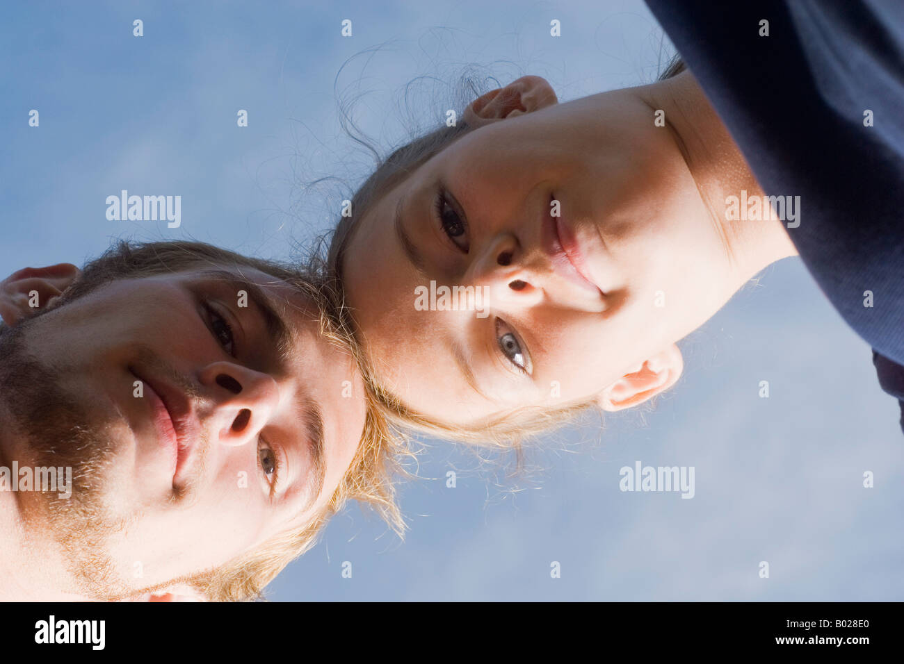 low angle portrait of young couple Stock Photo - Alamy