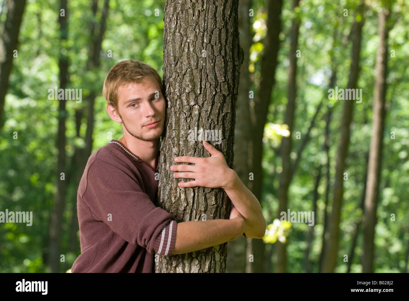 Man Hugging Tree