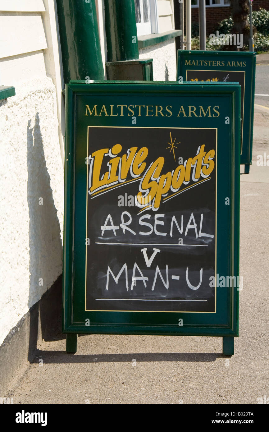 A pub sign advertising football, UK Stock Photo - Alamy