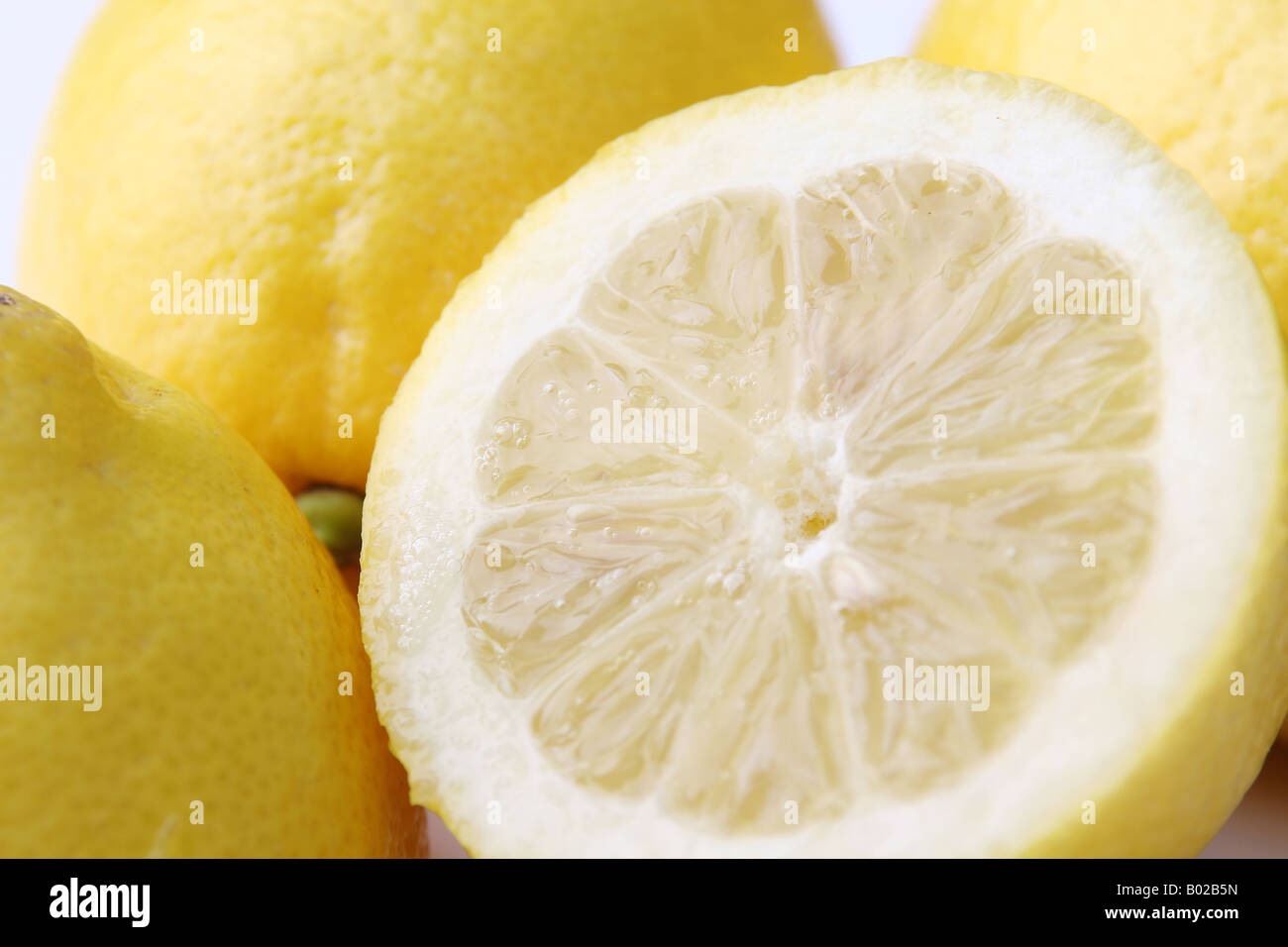 Close up of lemon cut in half Stock Photo - Alamy