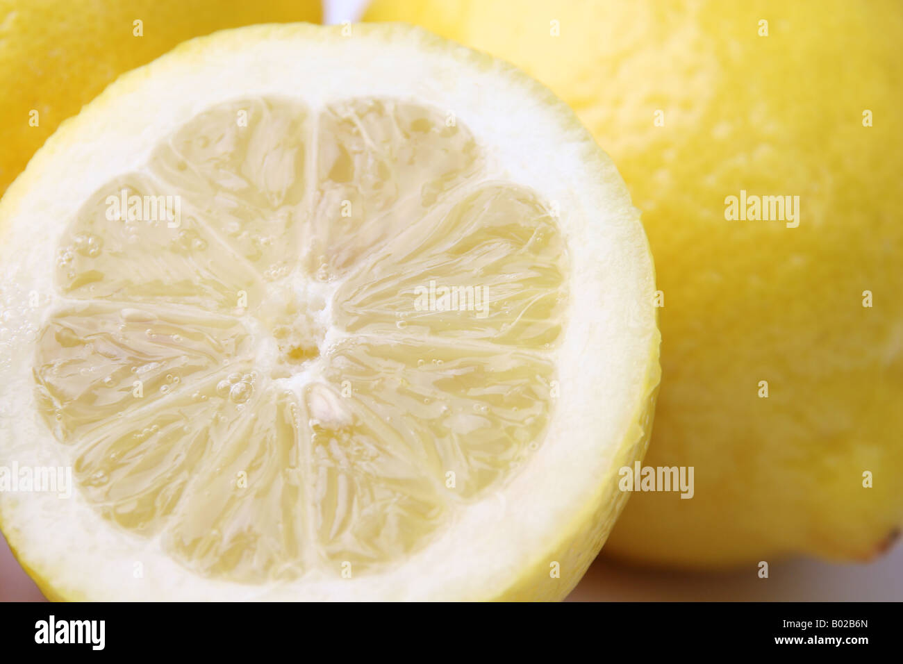 Close up of lemon cut in half Stock Photo - Alamy