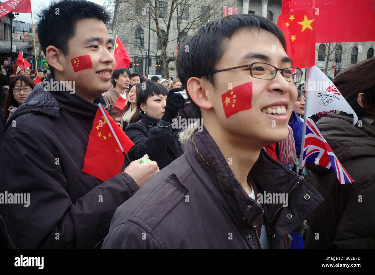 Two Young Chinese Students Celebrating the Procession of the Olympic ...