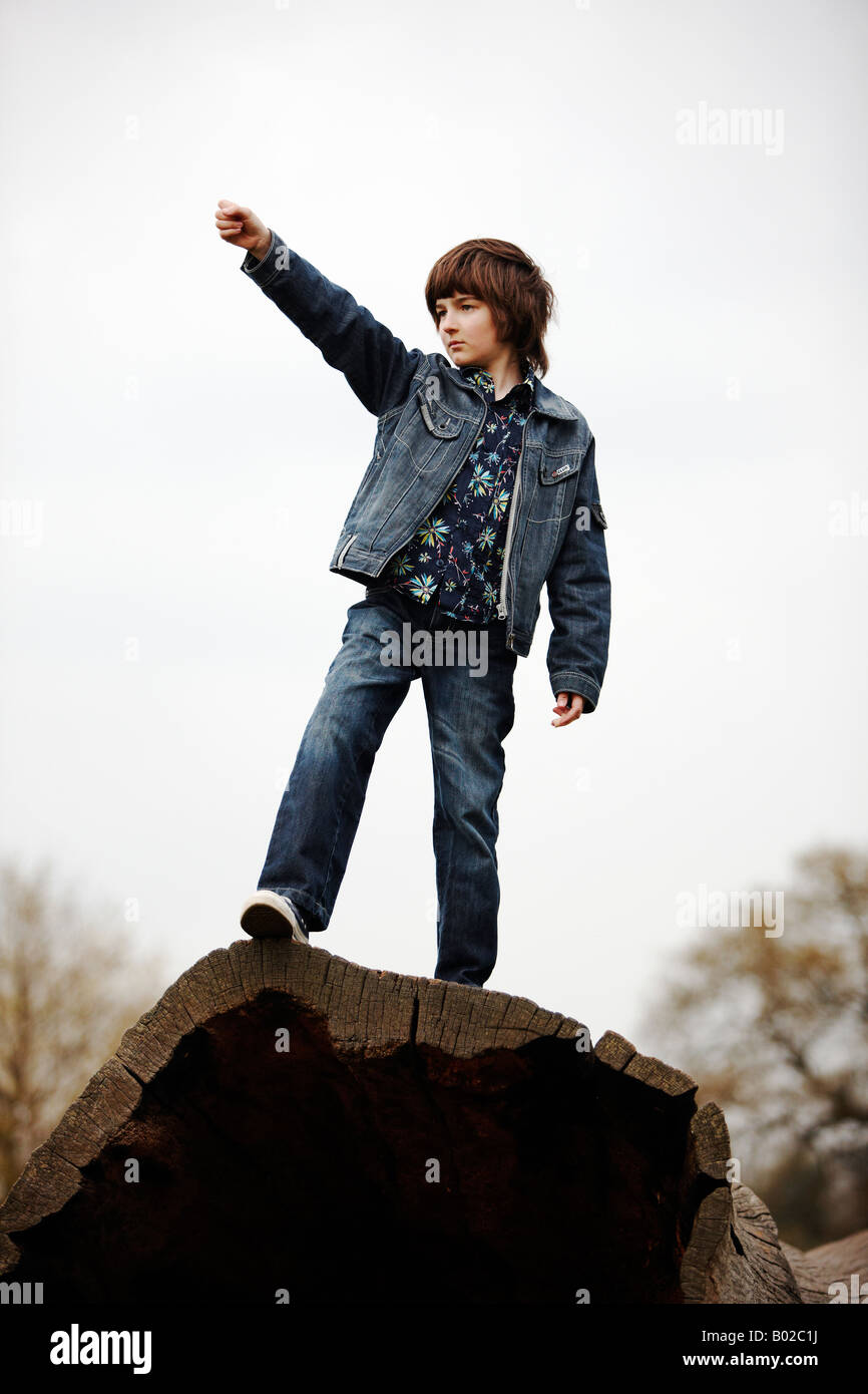 Handsome young boy, standing and saluting Stock Photo - Alamy