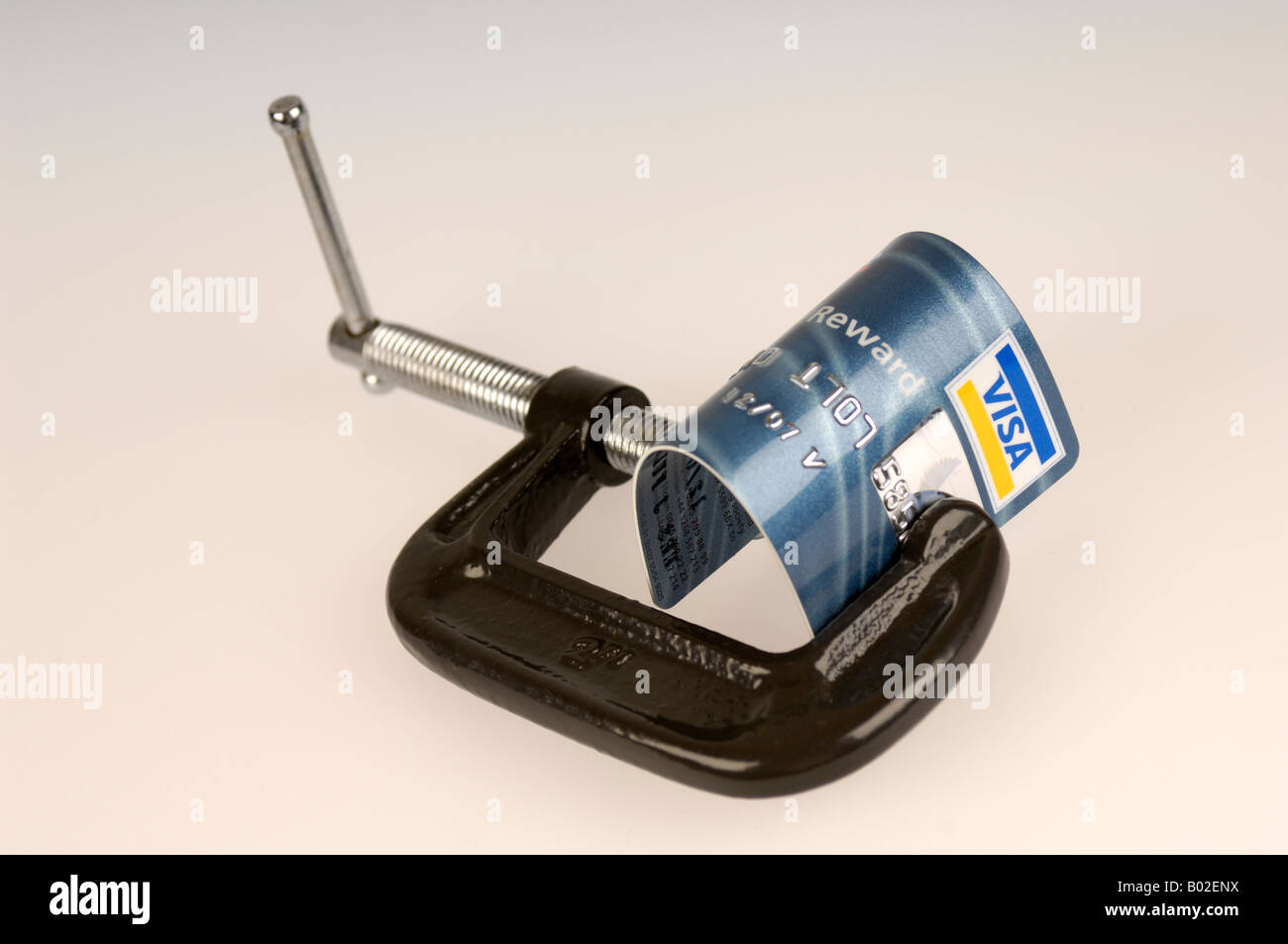 Credit card in a G Clamp Stock Photo - Alamy