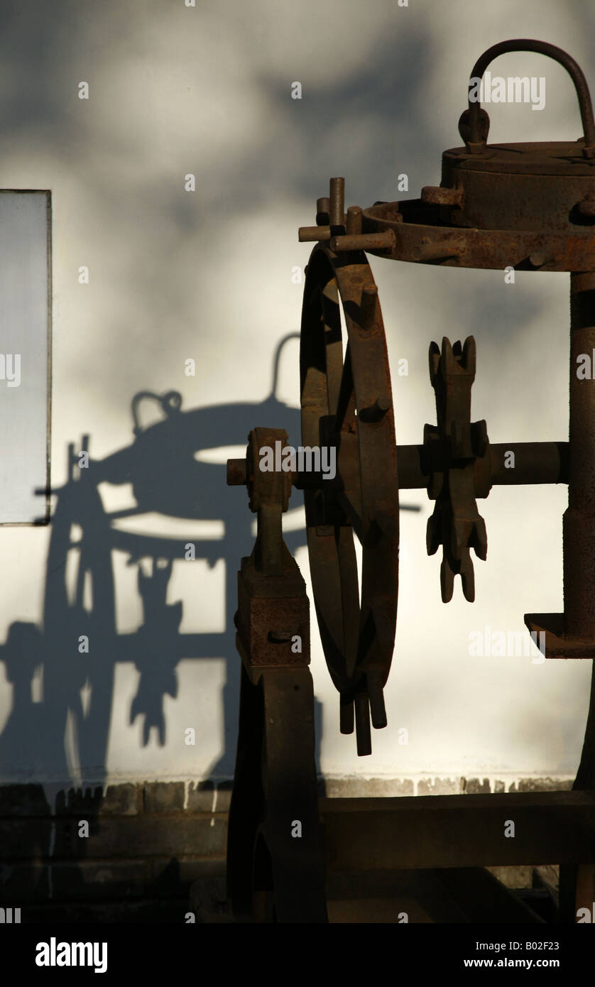 Rusting machine and shadow on wall in Small Wild Goose Pagoda Xian ...