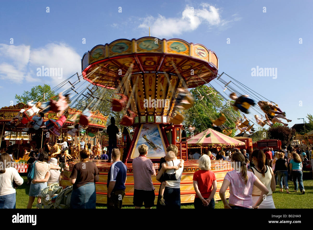 Fairground uk fair swings hi-res stock photography and images - Alamy
