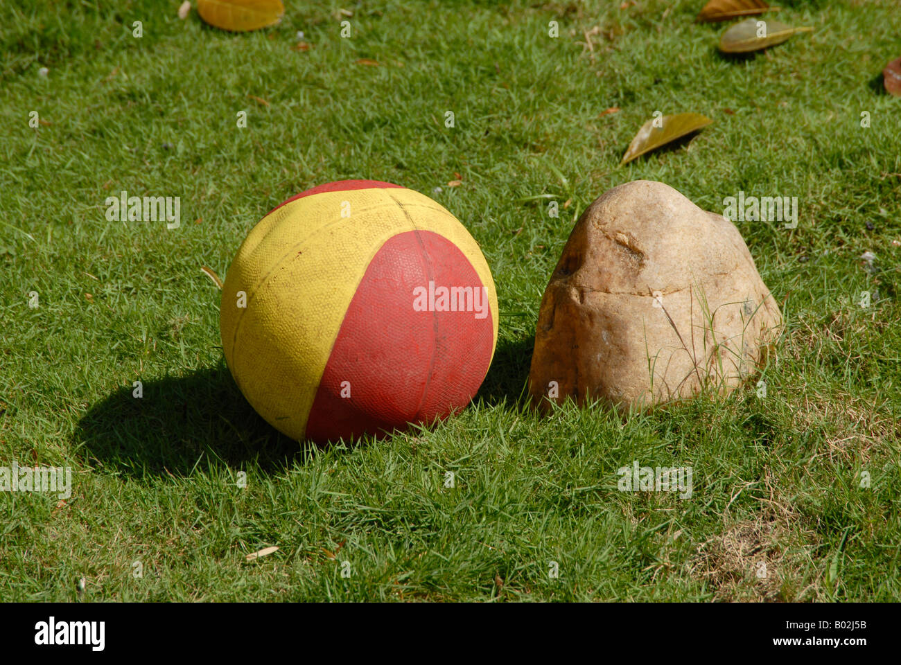 Ball and stone Stock Photo - Alamy