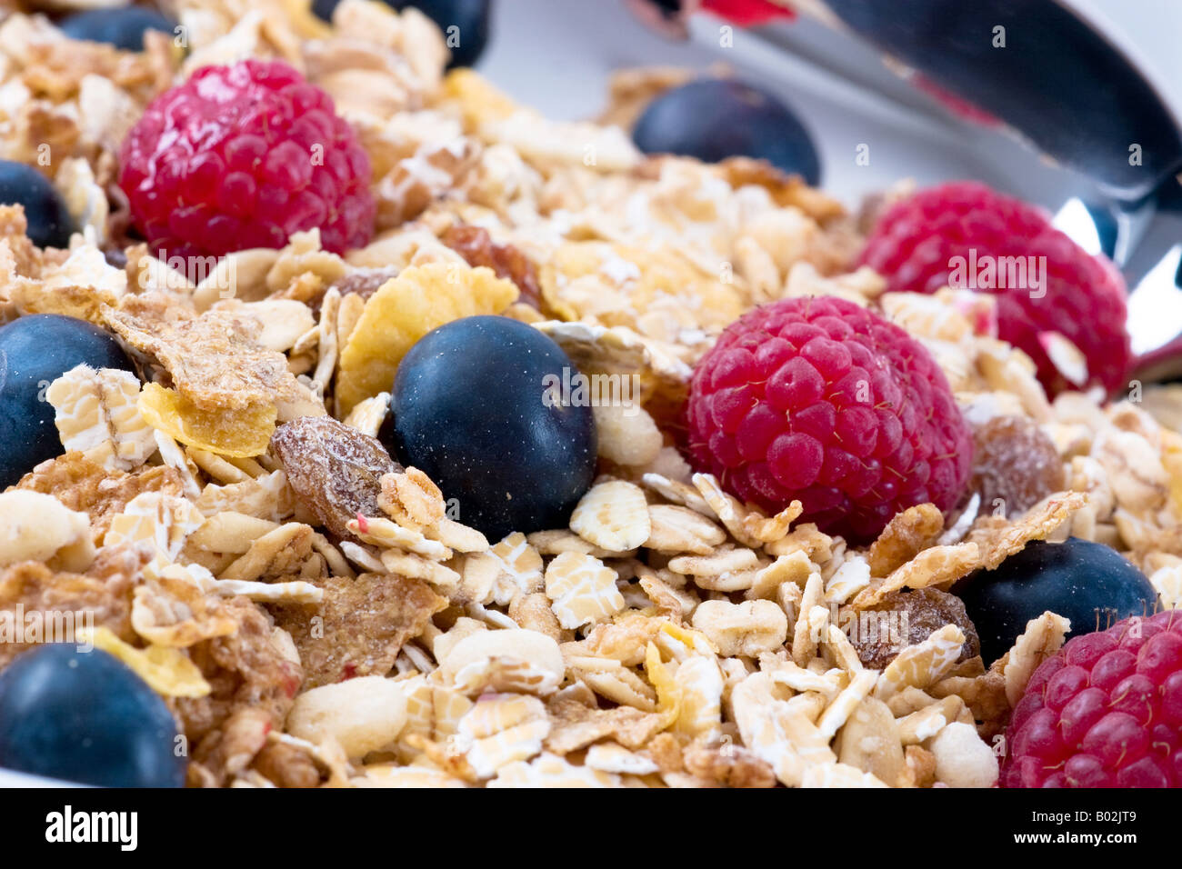 Breakfast Series Close up of a bowl of Muesli cereal with Raspberries ...