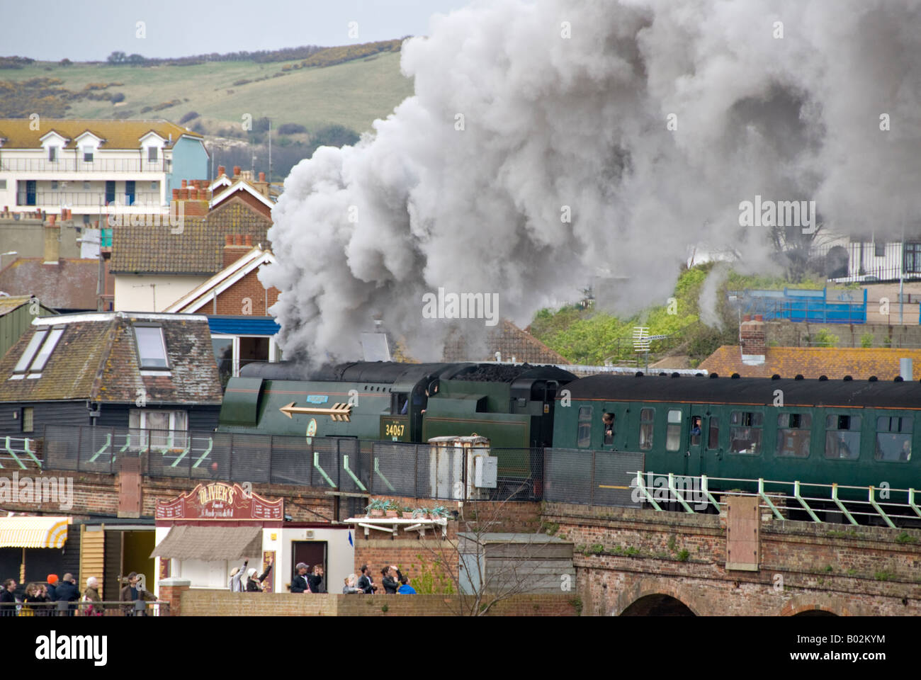 A steam charter train headed by 34067 'Tangmere' leaving Folkestone ...