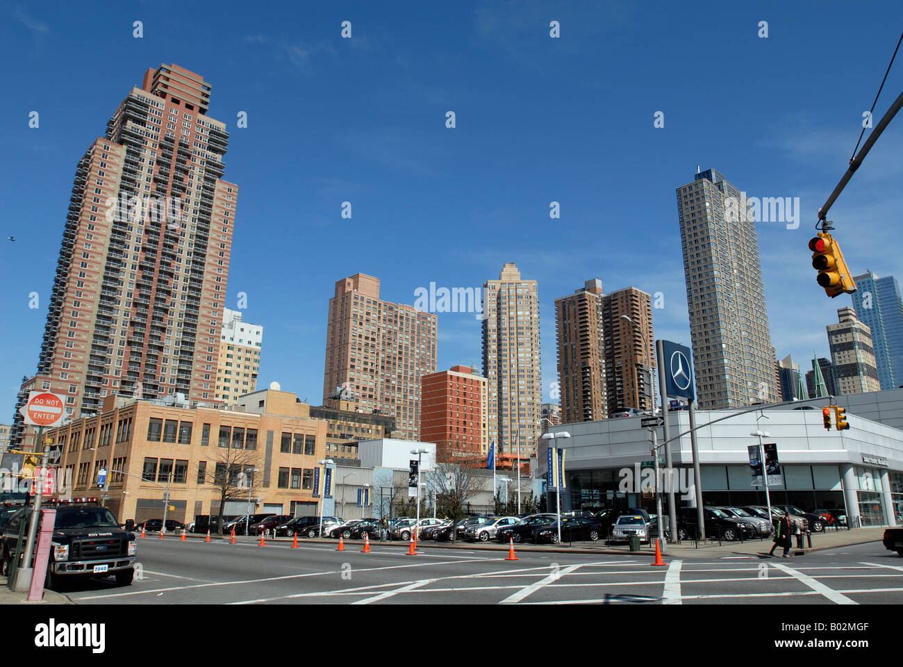 Luxury high rise buildings rise up in the Clinton neighborhood of ...