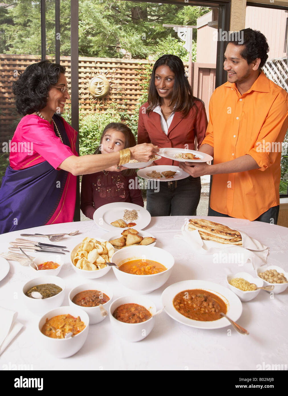 Indian couple dining table hi-res stock photography and images - Alamy