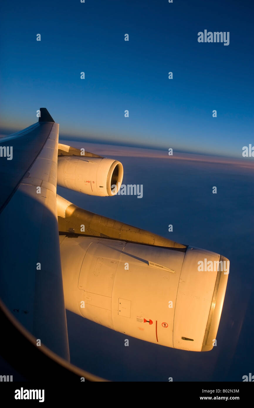 Airplane jet engine with golden sunset light Stock Photo - Alamy