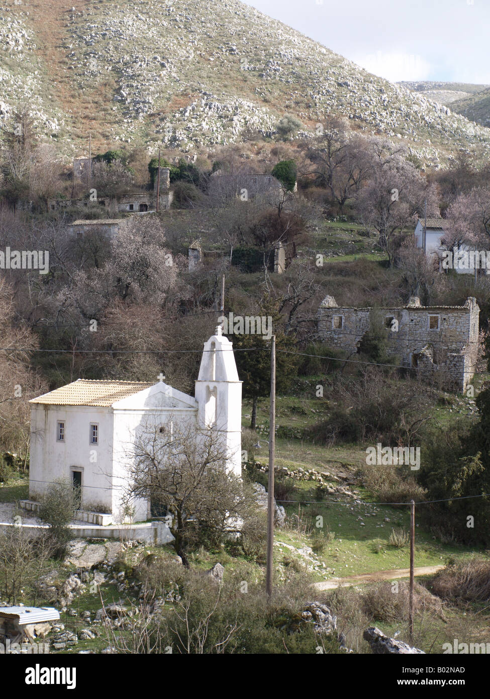 VILLAGE SCENE WITH CHURCH IN OLD PERITHIA CORFU GREECE Stock Photo - Alamy
