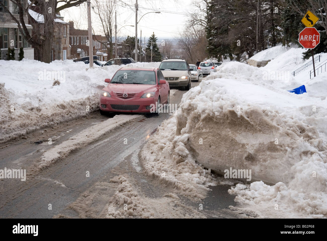 Traffic in a snow bound suburb in Montreal Stock Photo - Alamy