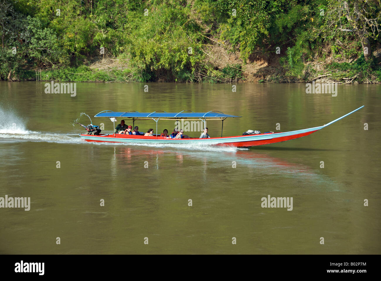 Longtail boat with tourists Mae Nam Kok River Chiang Rai Province ...