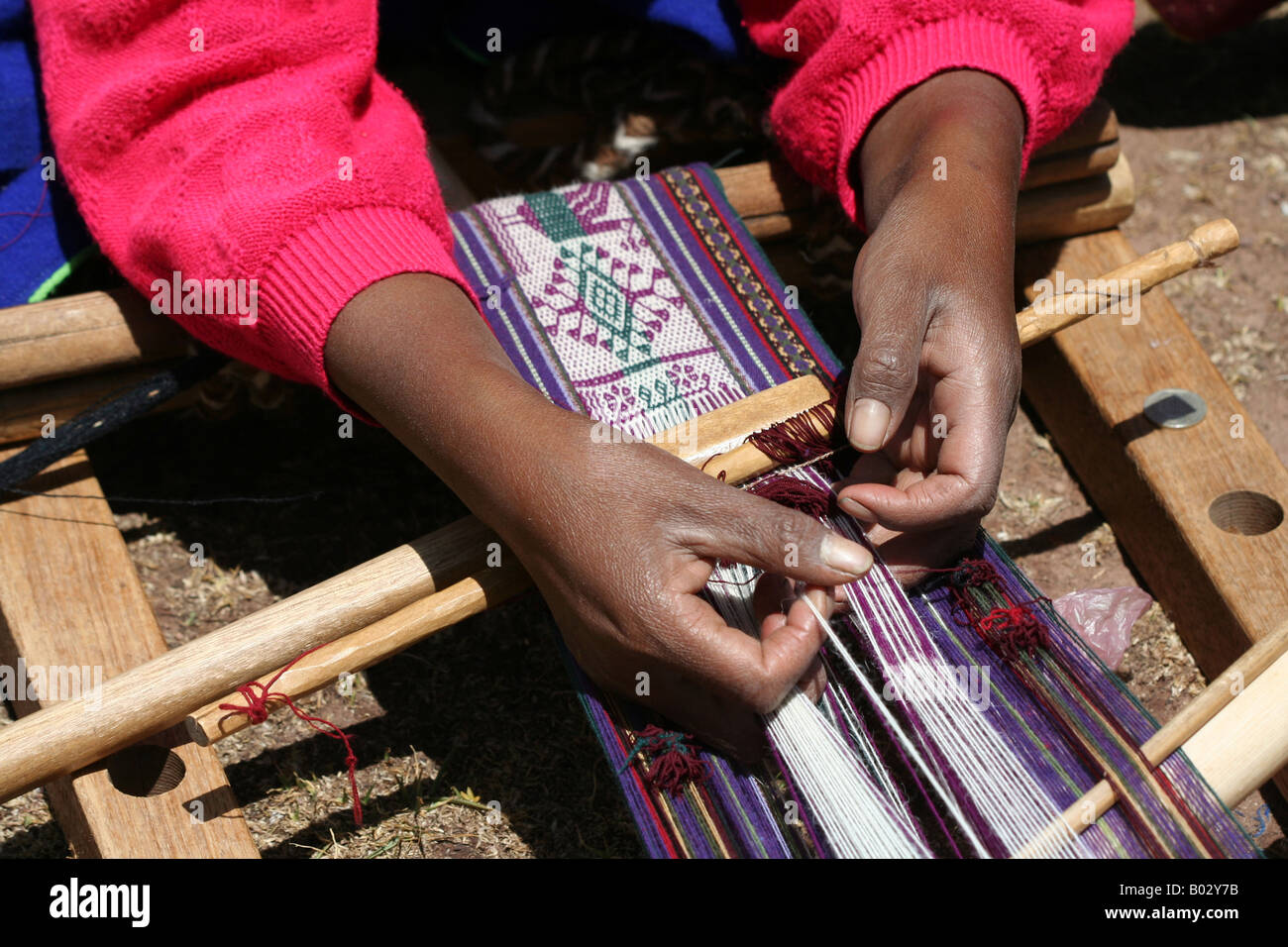 hands of traditional woman weaving thread wool taquile island peru lake ...