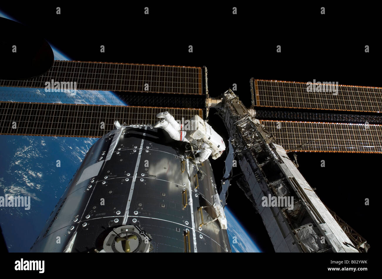 Astronaut participating in extravehicular activity Stock Photo - Alamy