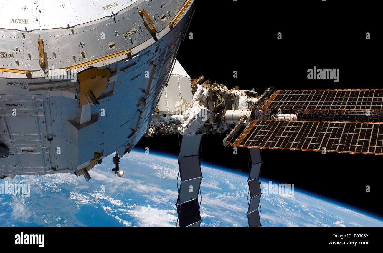 Astronaut participating in extravehicular activity Stock Photo - Alamy