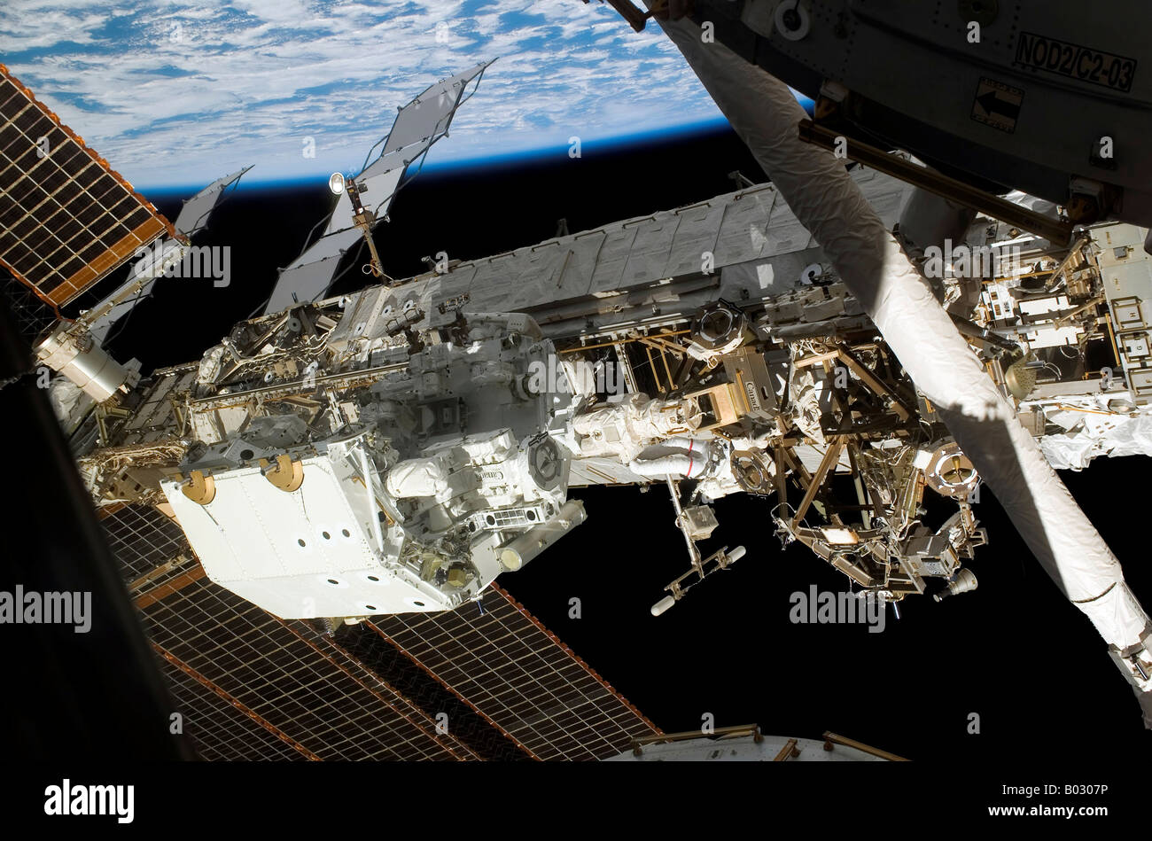 Astronaut participating in extravehicular activity Stock Photo - Alamy