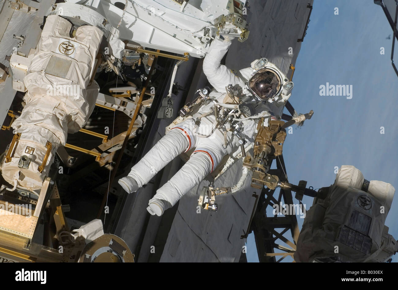 Astronaut participating in extravehicular activity Stock Photo - Alamy