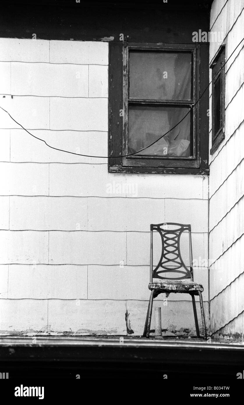 A chair beneath a window in Kearney, Nebraska Stock Photo - Alamy