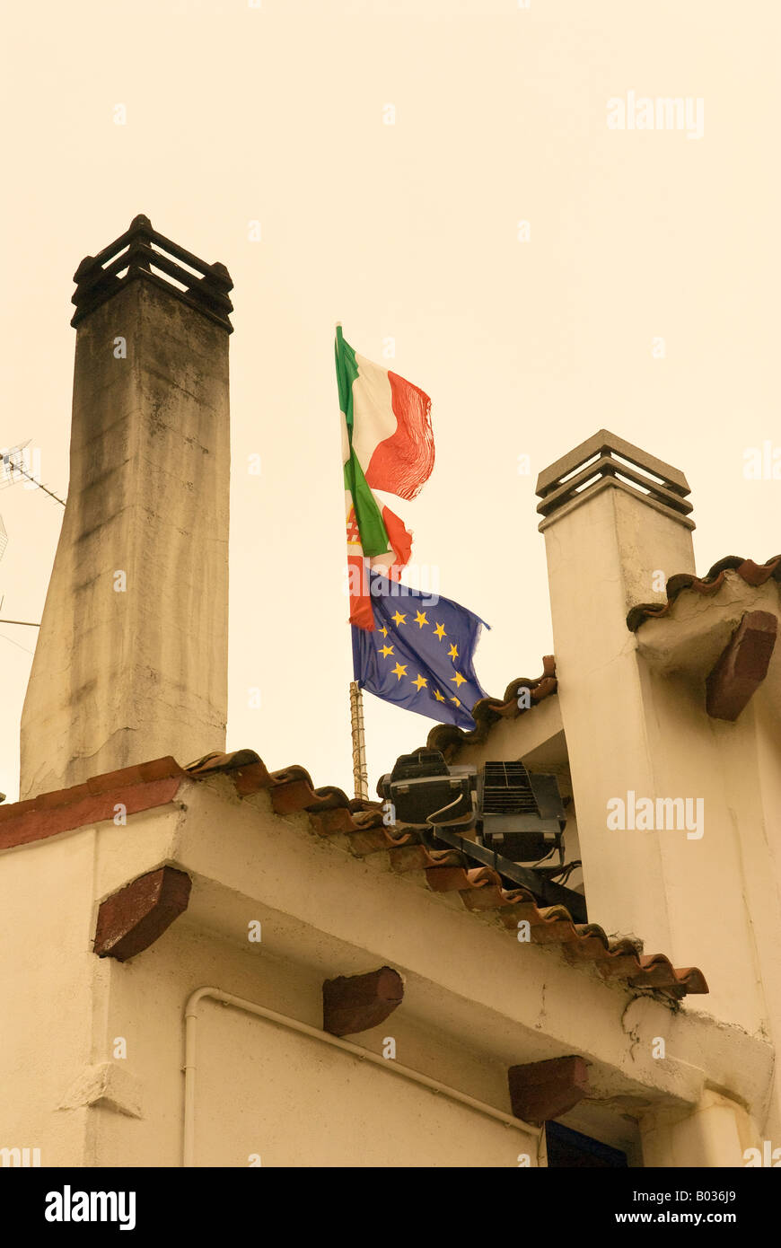 Flags on a roof Stock Photo - Alamy