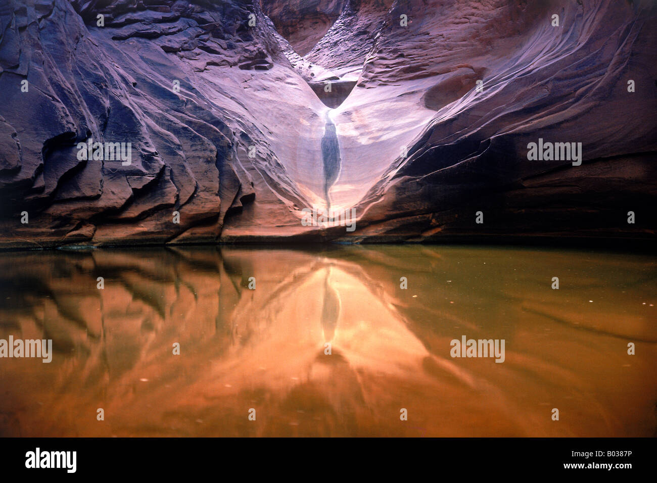 Pool carved into rocks near Colorado River at North Canyon grotto ...