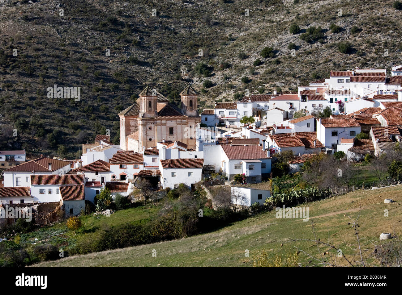 The white village of Alpandeire in the Genal Valley near Ronda Malaga ...