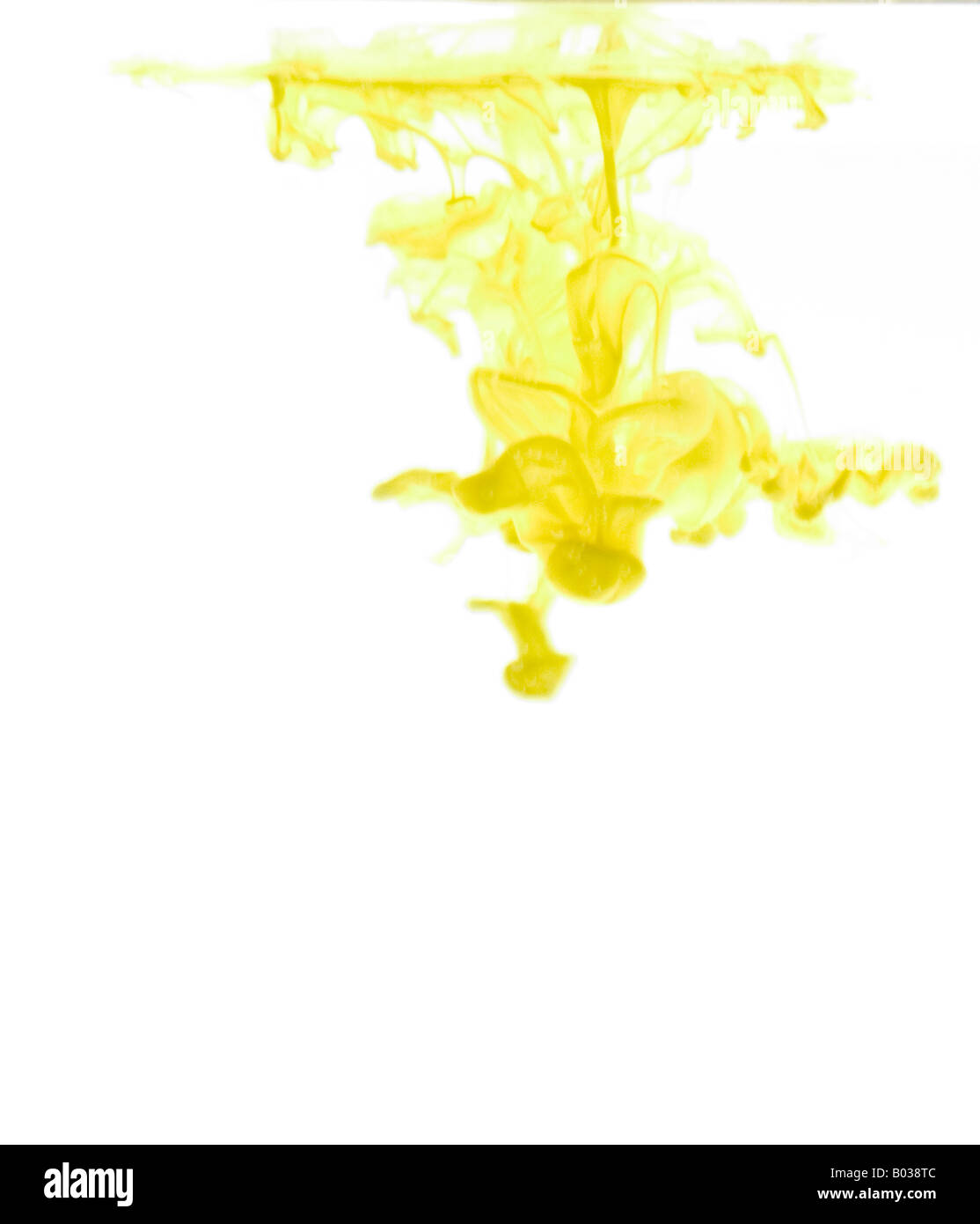Yellow ink in water Stock Photo - Alamy