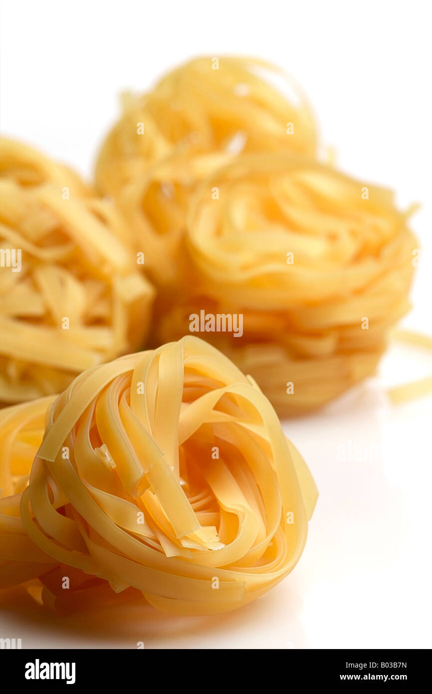coils of taglietelle on white Stock Photo - Alamy