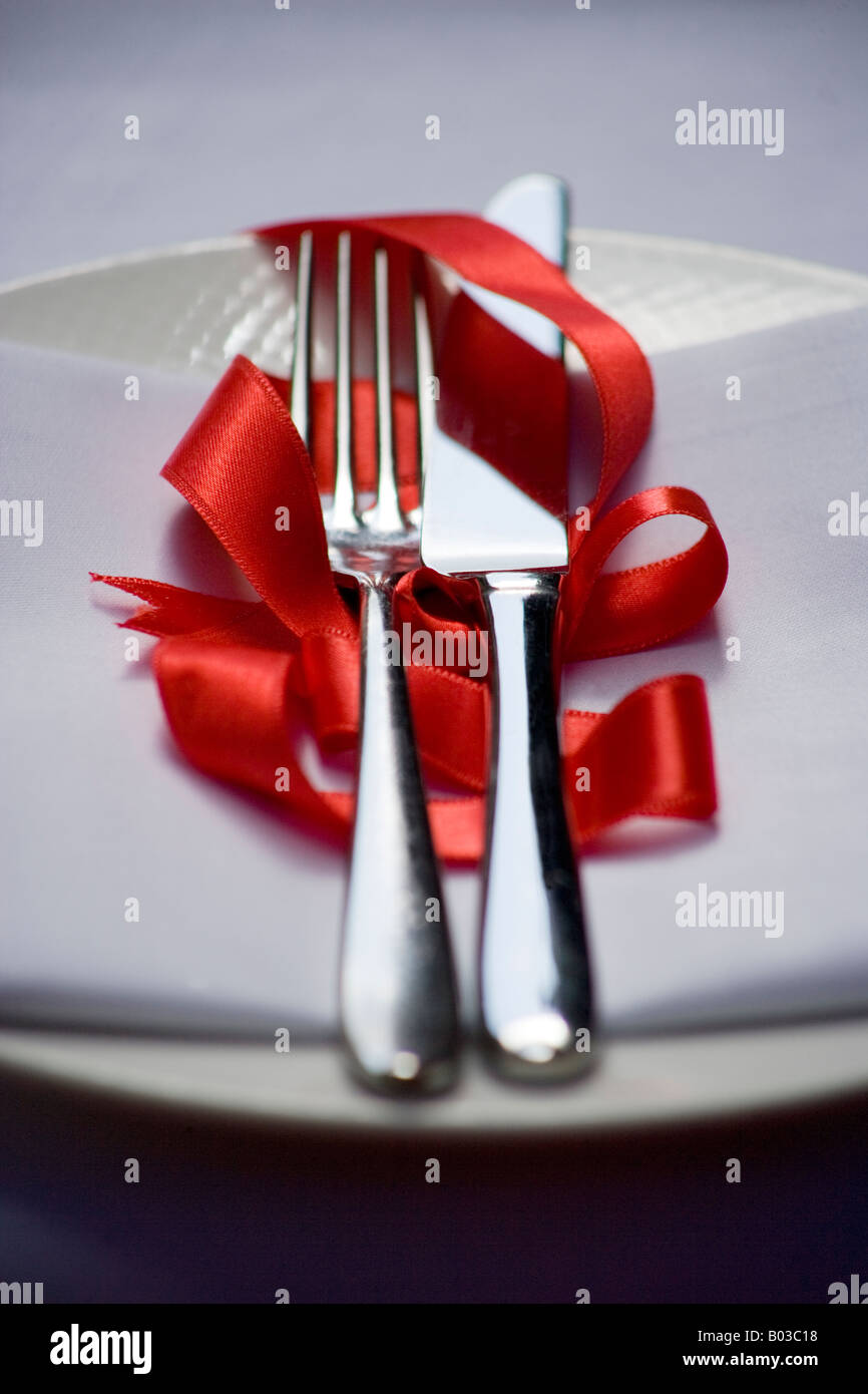 Knife and Fork with Ribbon Stock Photo - Alamy