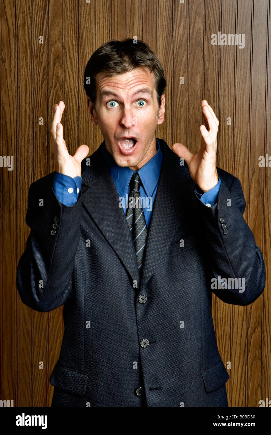 Man looking frightened or scared Stock Photo - Alamy