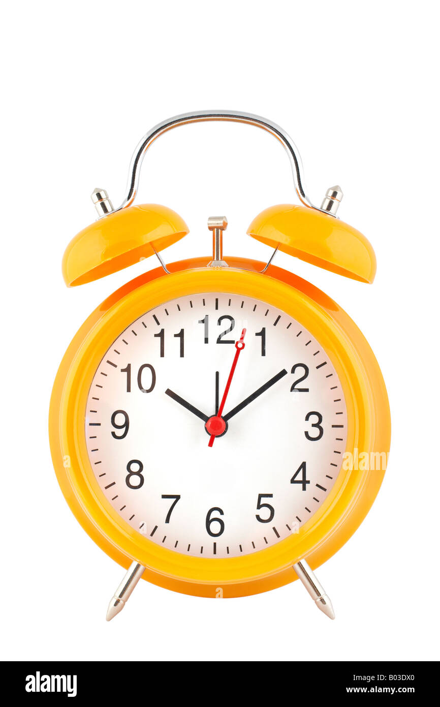 Yellow alarm clock with bells on top isolated over white background ...