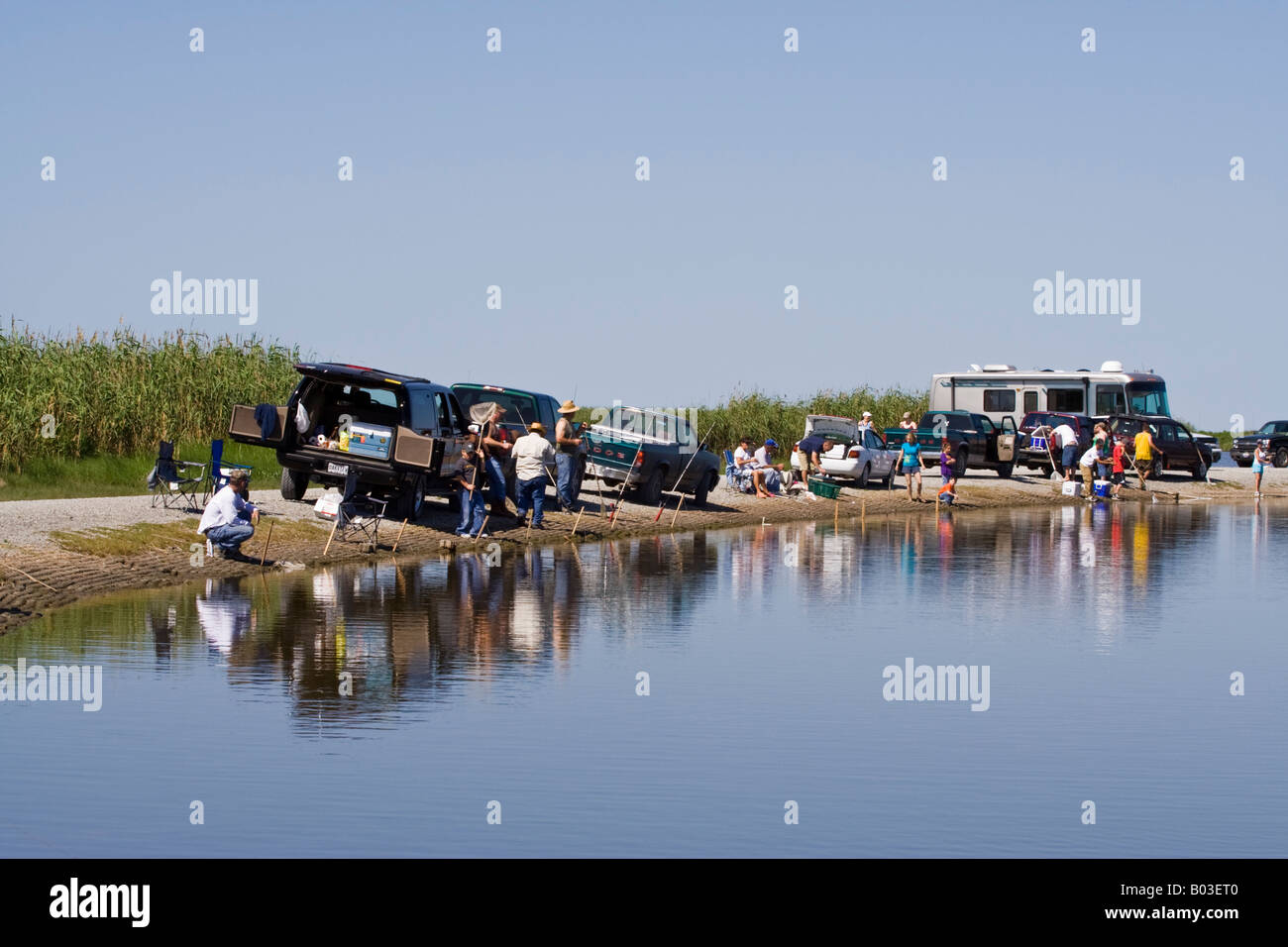 Families enjoy crabbing in Rockefeller Wildlife Refuge located in ...