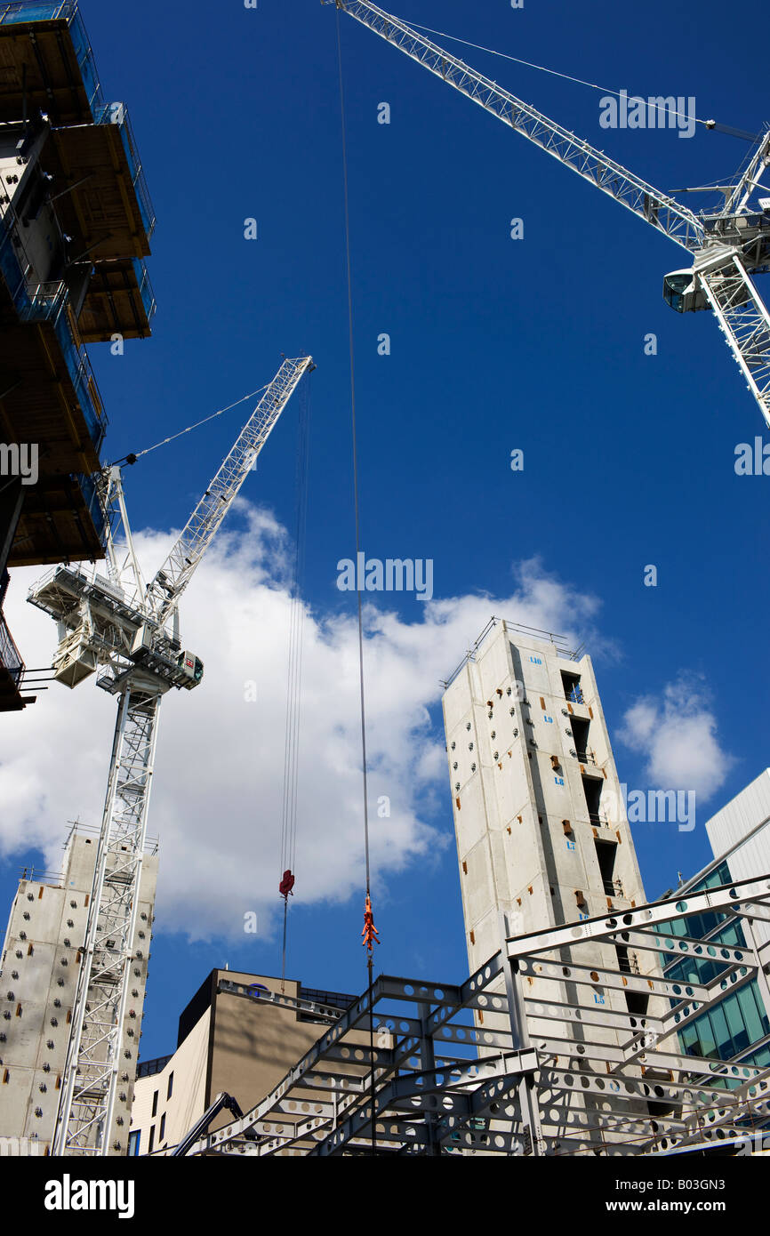 cranes on construction site Stock Photo - Alamy