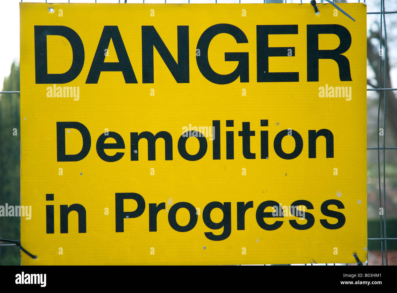 Warning " Demolition in Progress " sign Stock Photo - Alamy