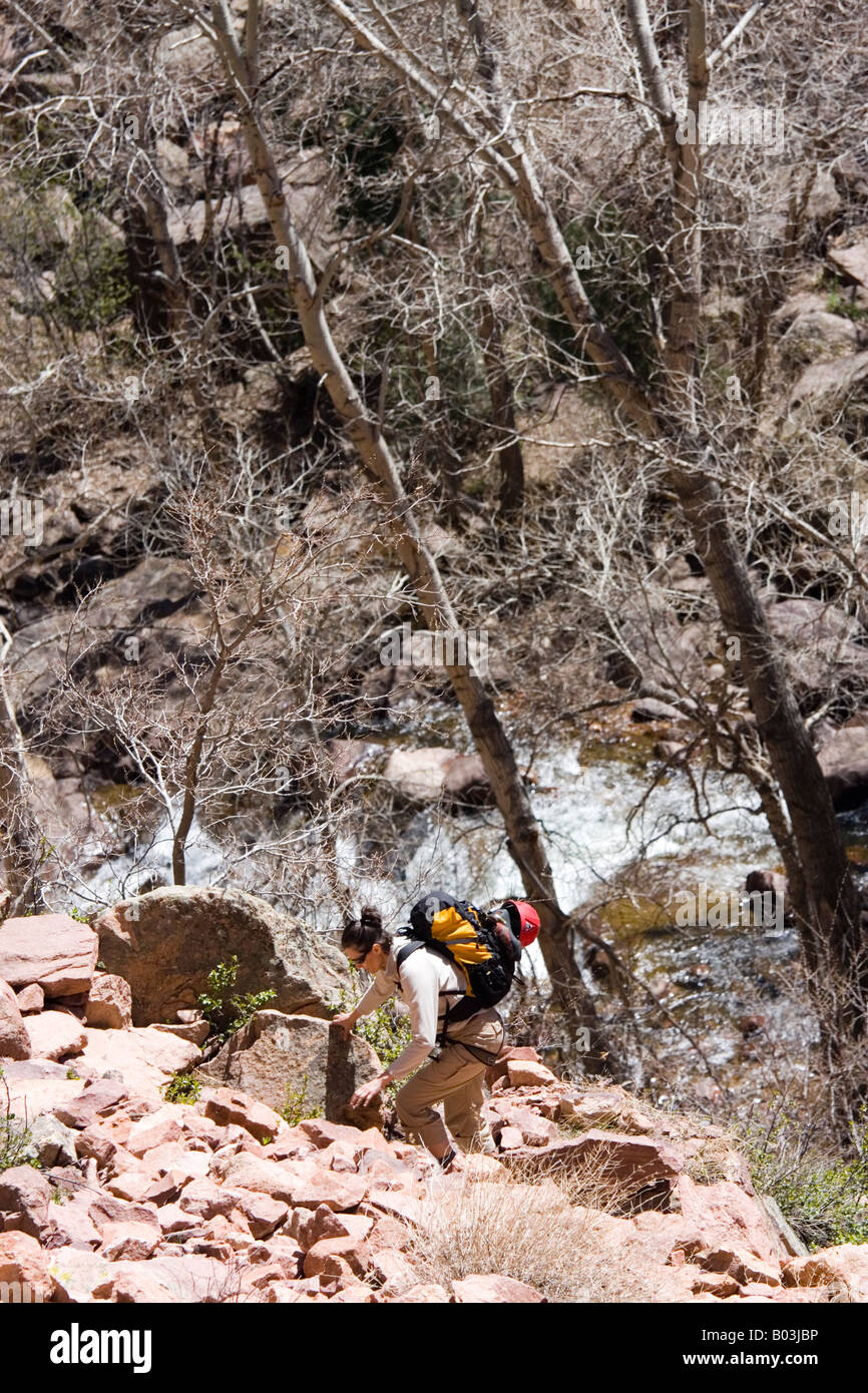Backpacker on a Cliff Stock Photo - Alamy