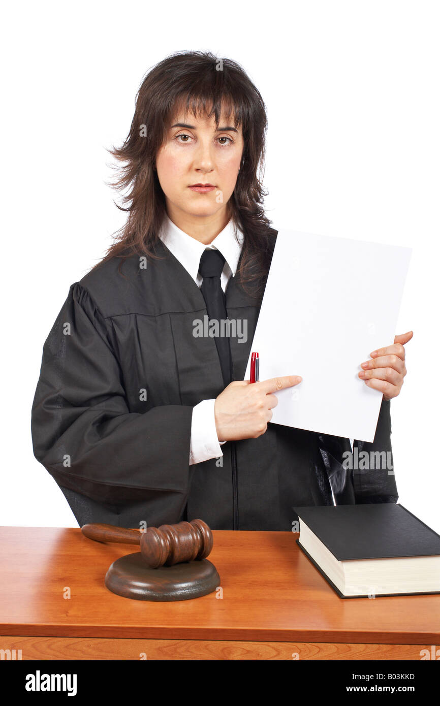A female judge points to blank court order over a white background ...