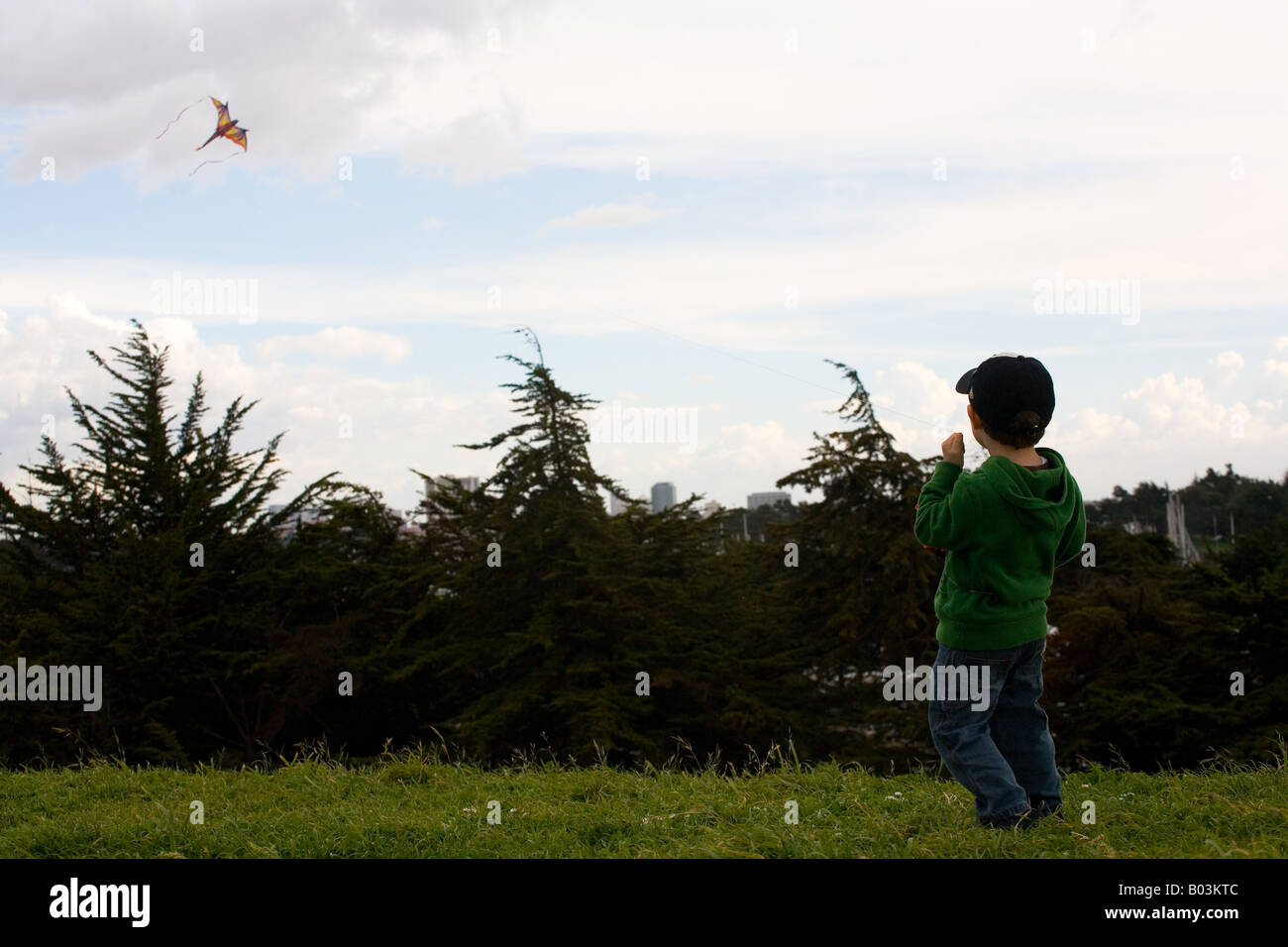 boy flying a kite Stock Photo - Alamy