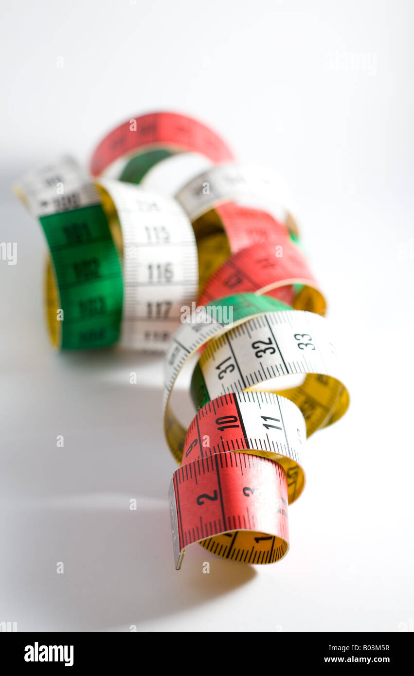 Strip of multicloured measuring tape, closeup Stock Photo - Alamy