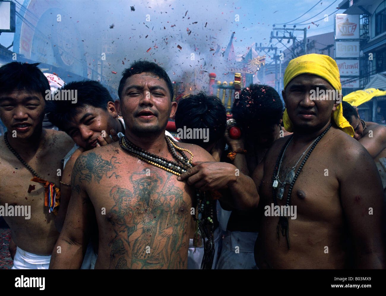 Chest carriers stopping for a breather Stock Photo - Alamy
